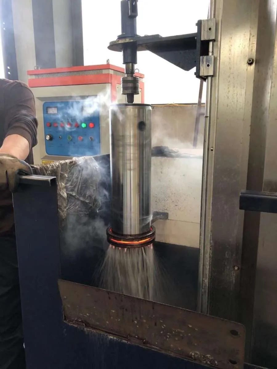 CNC vertical induction quenching machines for hardening shafts rollers ...