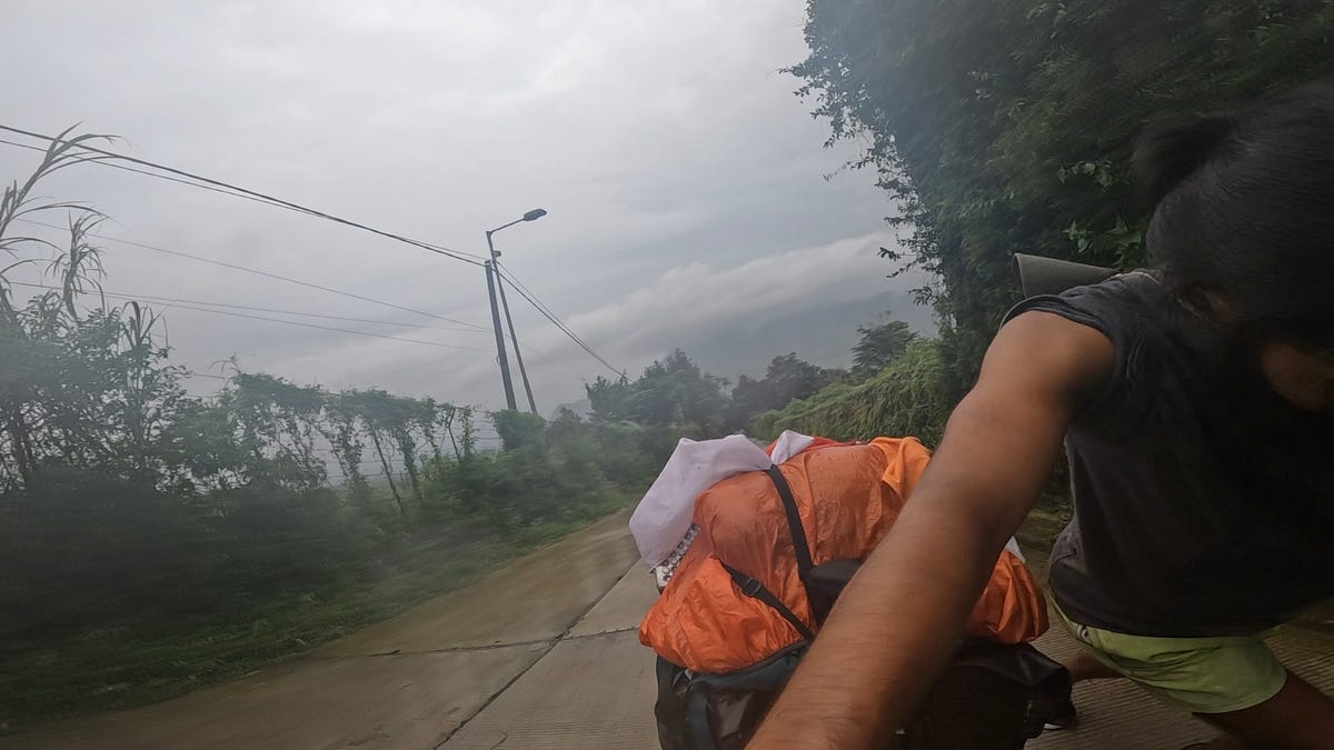 Overcoming the Fierce Rain and Wind Beyond the 1000m Climb | World ...