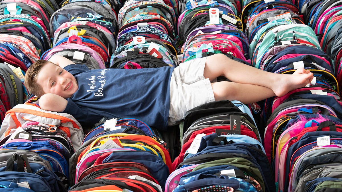 ‘Pack’ in action: Backpack Buddy donates hundreds of bags | by Kristen ...
