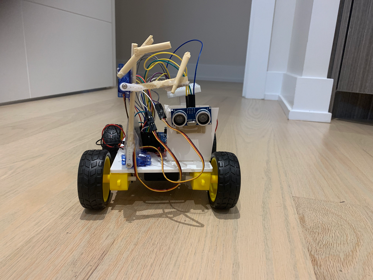 A Step Toward Cleaner Cities : An Autonomous Trash-Collecting Robot ...