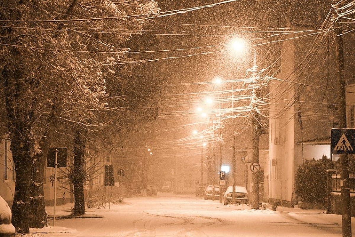 Snow Falling At Night In The City