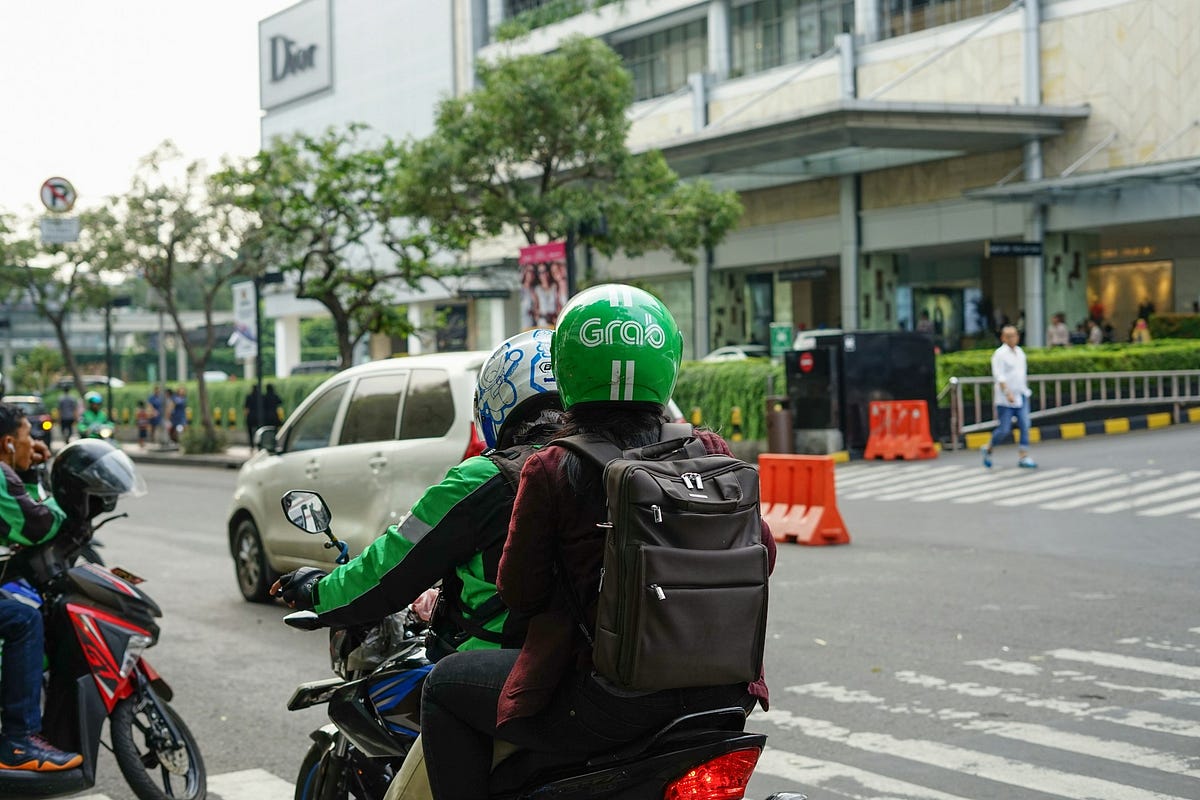 Grab vs. The Market: Is This the Best Ride-Hailing Stock for 2025? | by ...