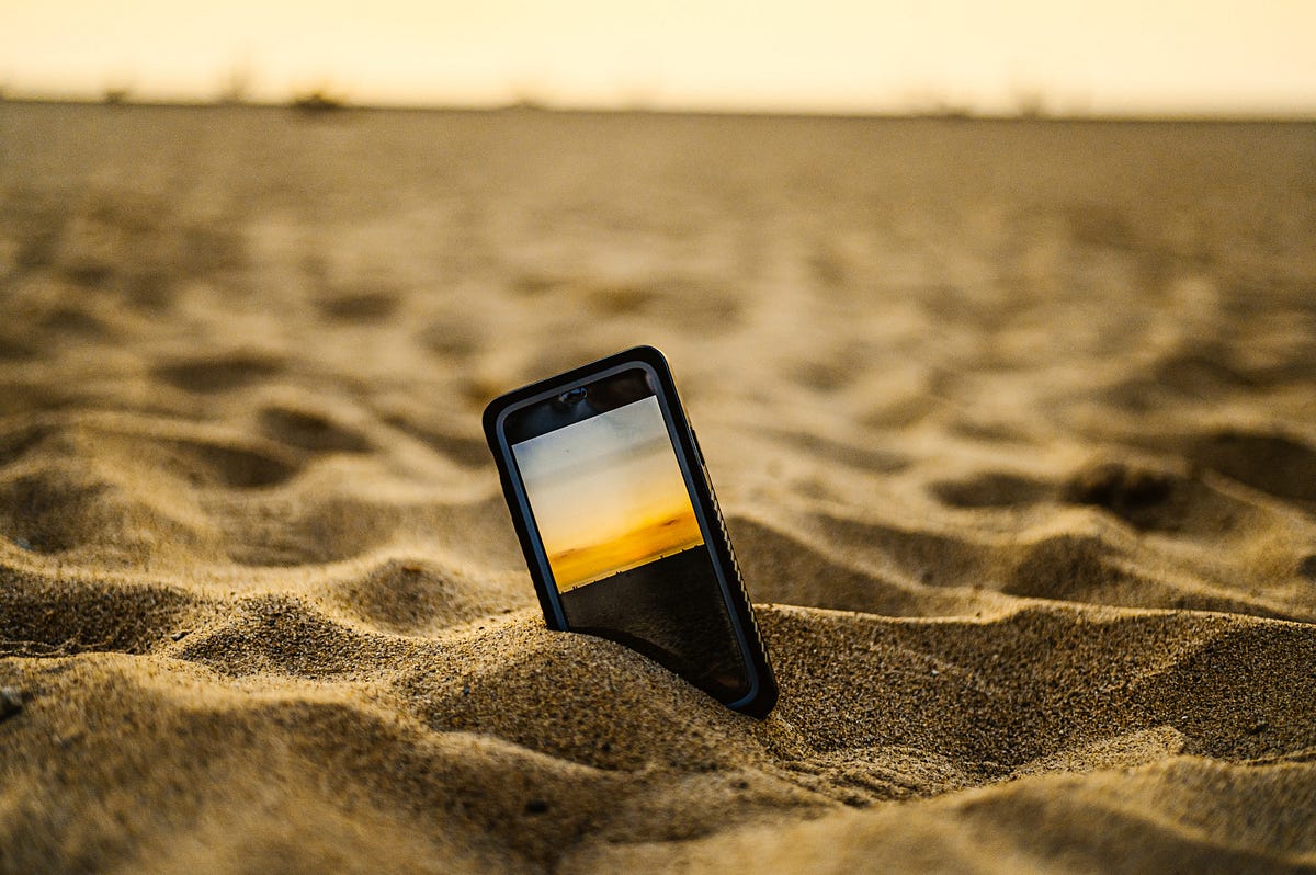 Put Your Phone in the Sand. I’ve been working remotely in SW… | by ...