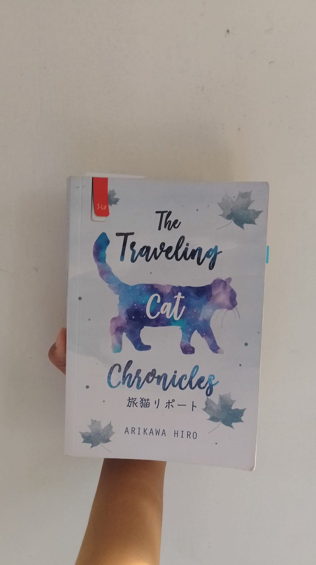 The Traveling Cat Chronicles: Sebuah Utas Kehidupan Manusia dari Sudut ...