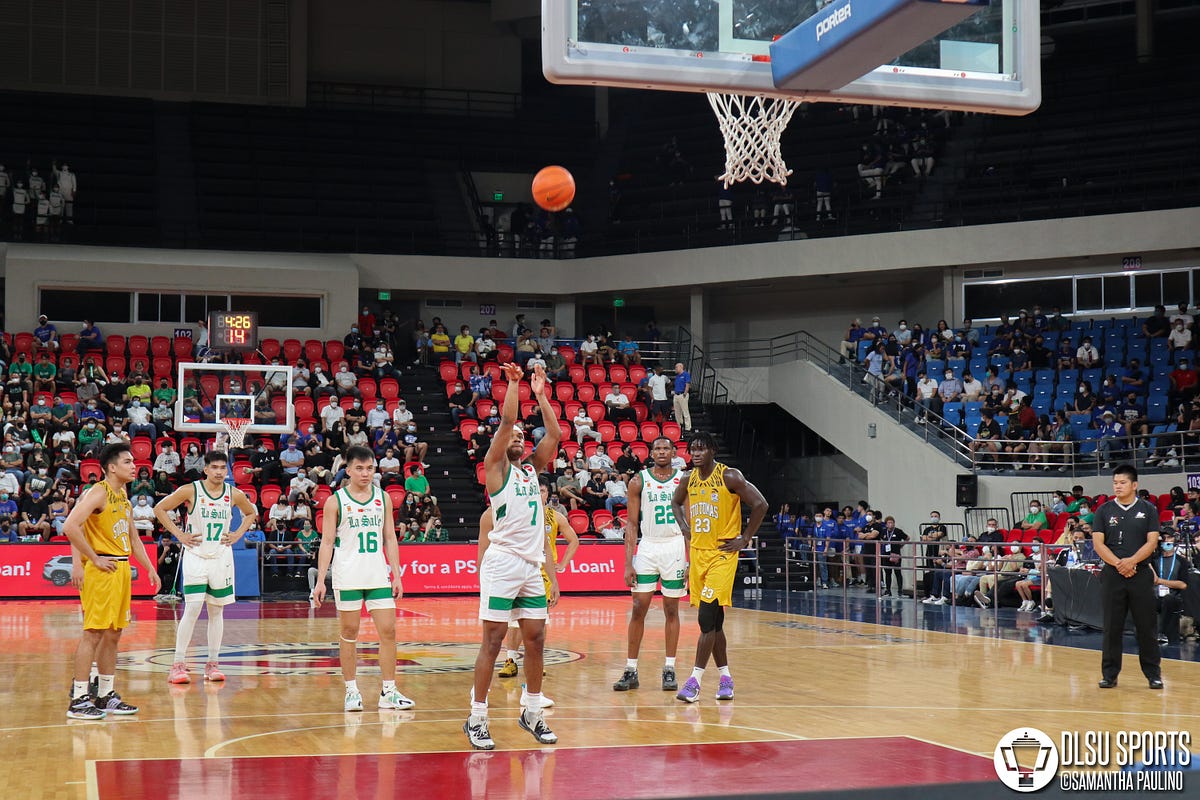 The first W: Green Archers pierce through UST | by Miki Santos | DLSU ...