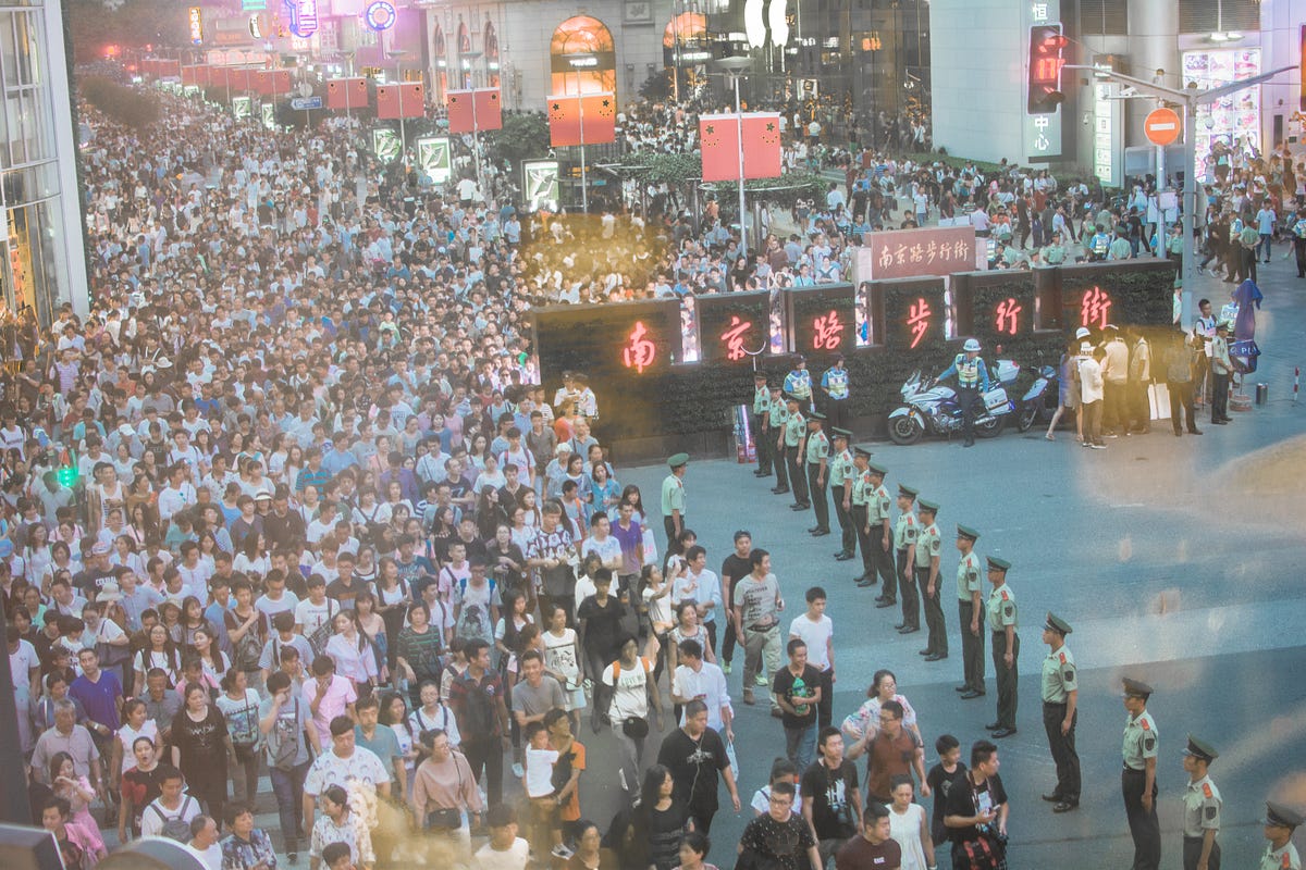 Chinese-style Crowd Control. Its literally people mountain, people ...