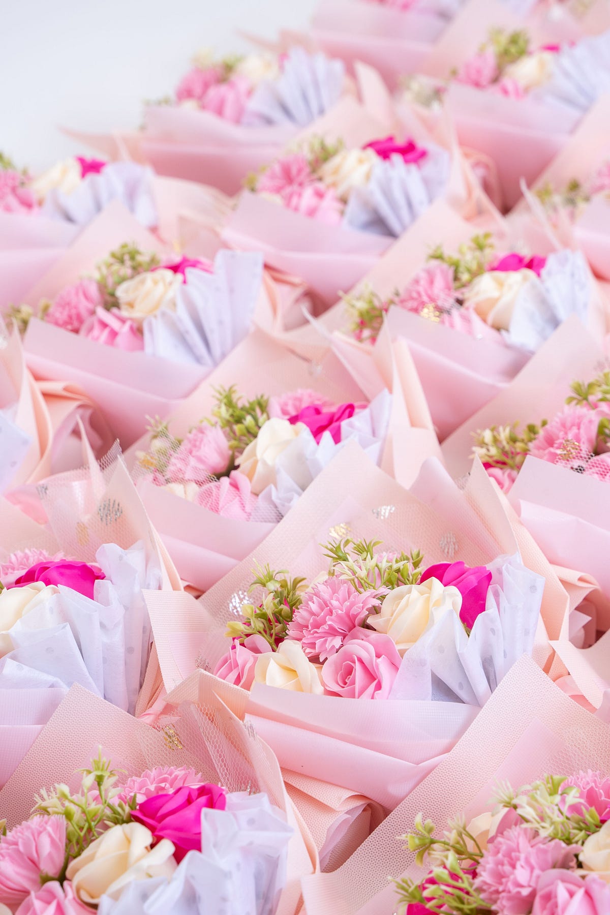 The flowers are all different colors, including pink, white, and yellow ...