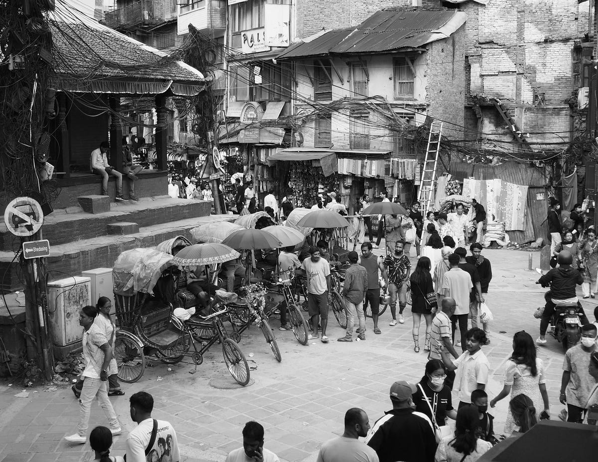 Faces. Kathmandu, Nepal | by Charles Source | Write Under the Moon | Medium