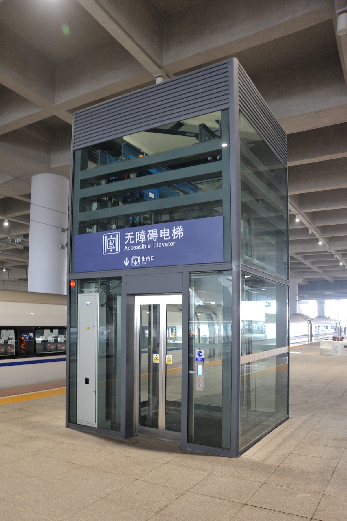 A Nontrivial Elevator Control System in a Train Station by ...