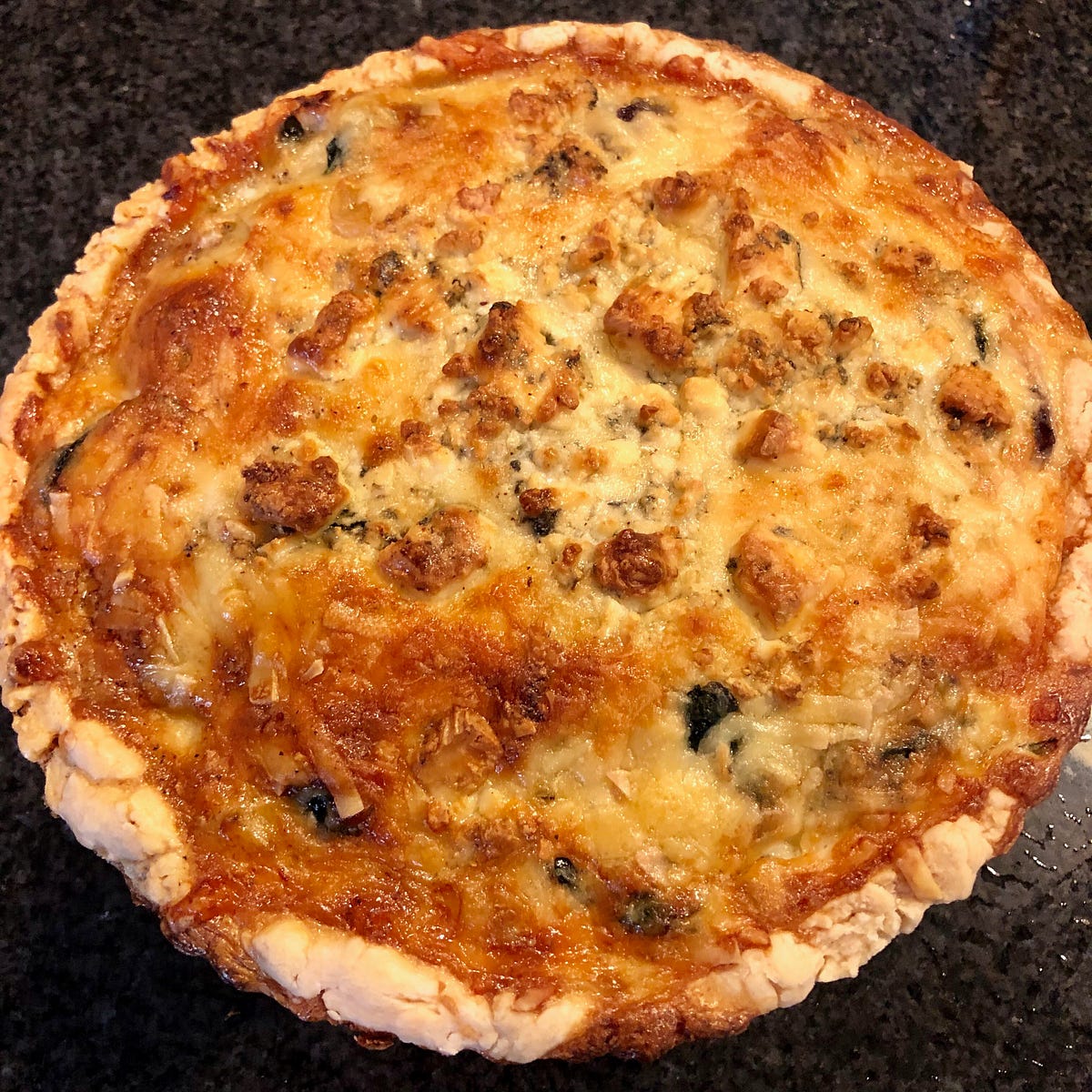 Spinach and cheese Quiche. This is a. savory French tart made with… | by Mamta Basnet | Medium