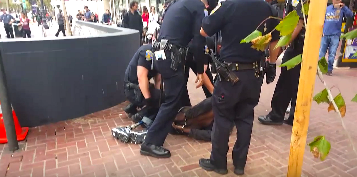 I Watched 14 Police Officers Take Down a One-Legged Homeless Black Man ...