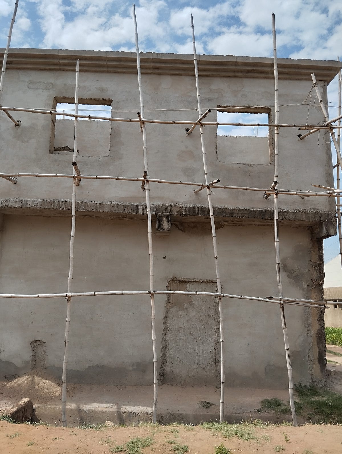 Menhir Robot Behind A Scaffolding by Carl Terver | Medium