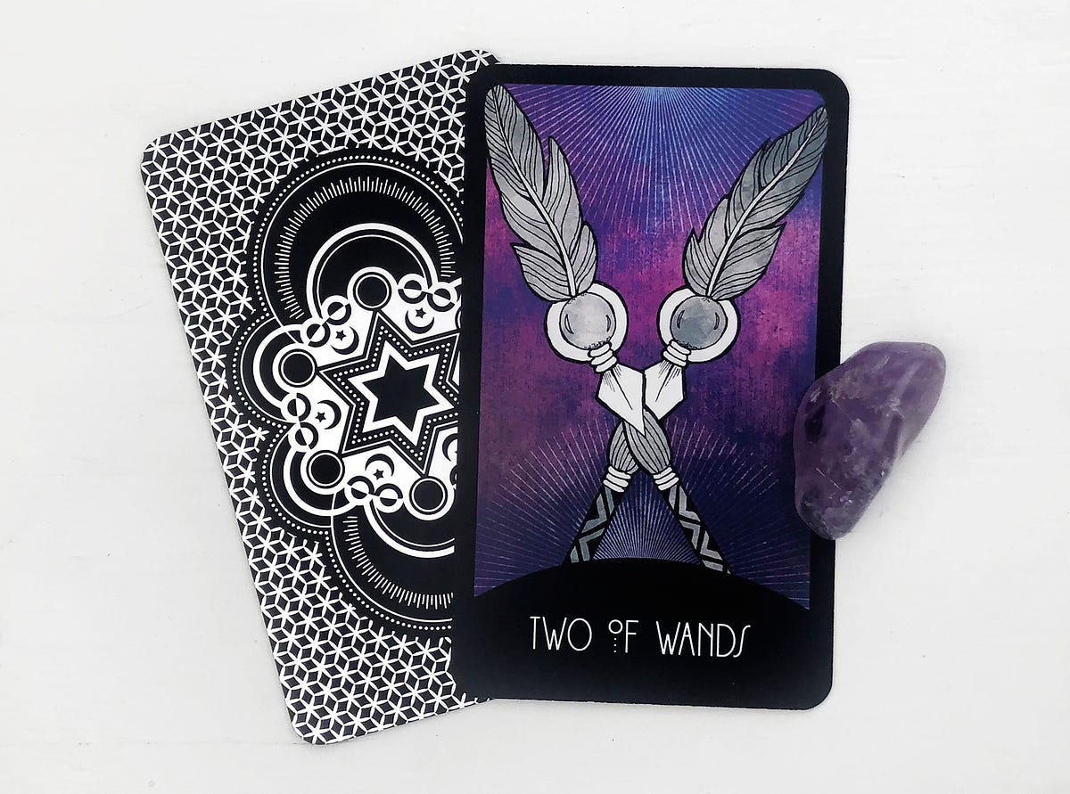 Strategic Planning and Bold Decisions: Unveiling the Two of Wands Tarot ...