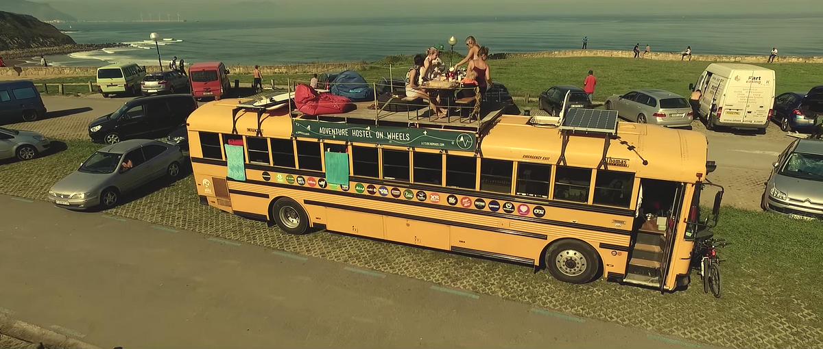 This couple converted a school bus into a travelling hostel and we are ...