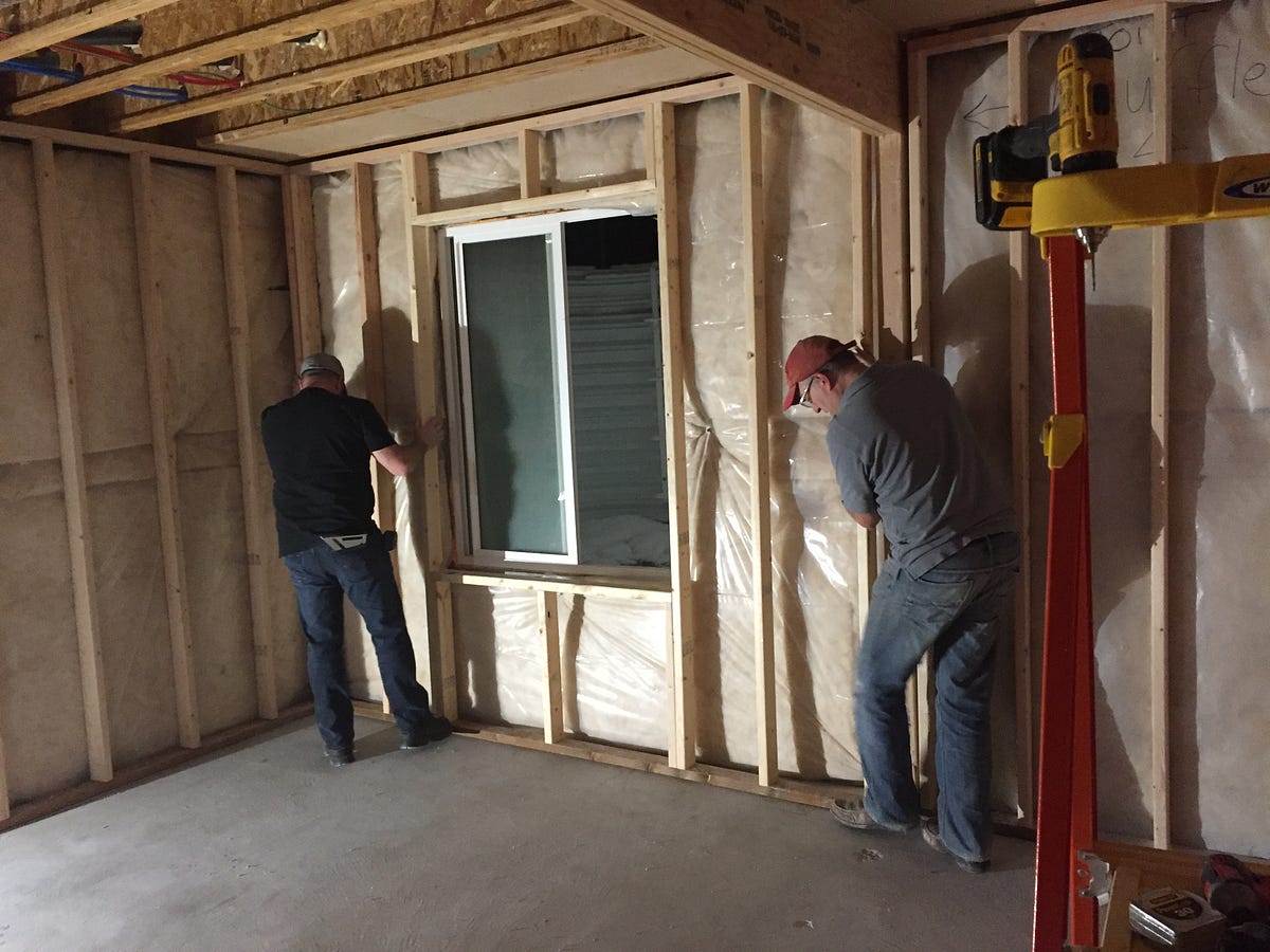 Framing and setting the interior floating walls of the studio — and ...