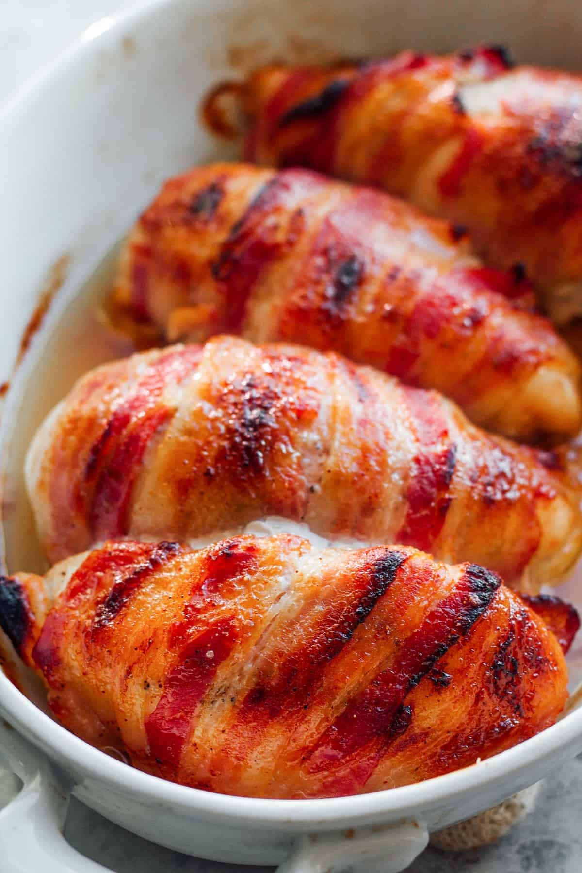 Bacon-wrapped Chicken Recipe. Bacon-wrapped chicken is a classic dish ...