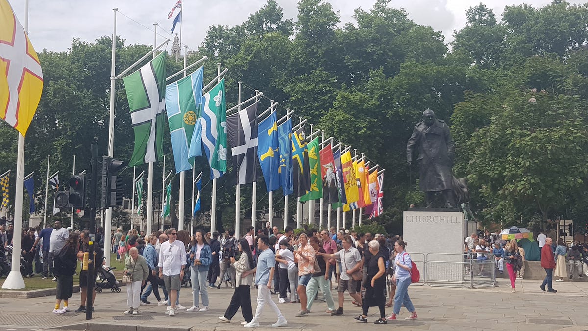 Colourful Flags on Parliament Square | by Ella Read | Ride the Wave | Aug, 2025 | Medium