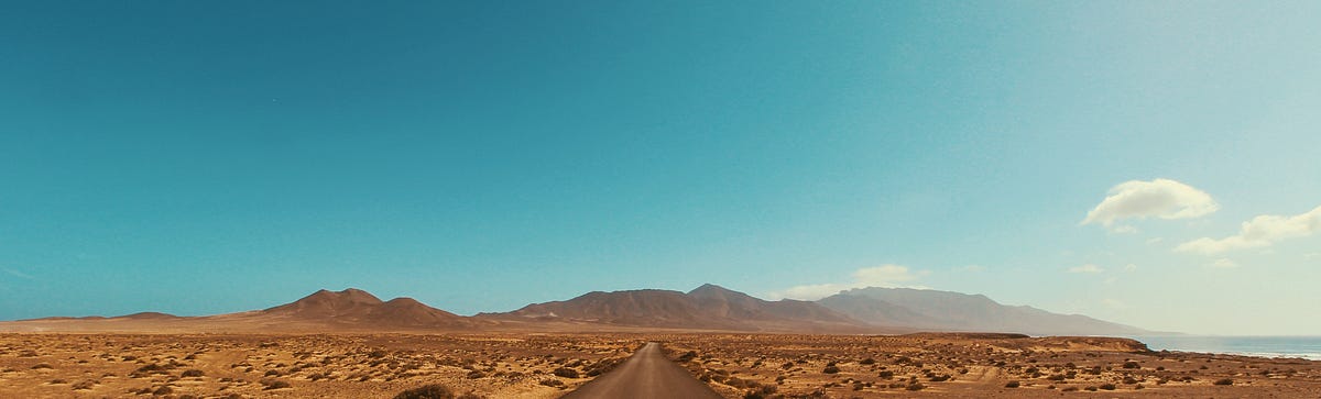 Ion. Desert horizons curve into periphery… | by Matthew | Medium