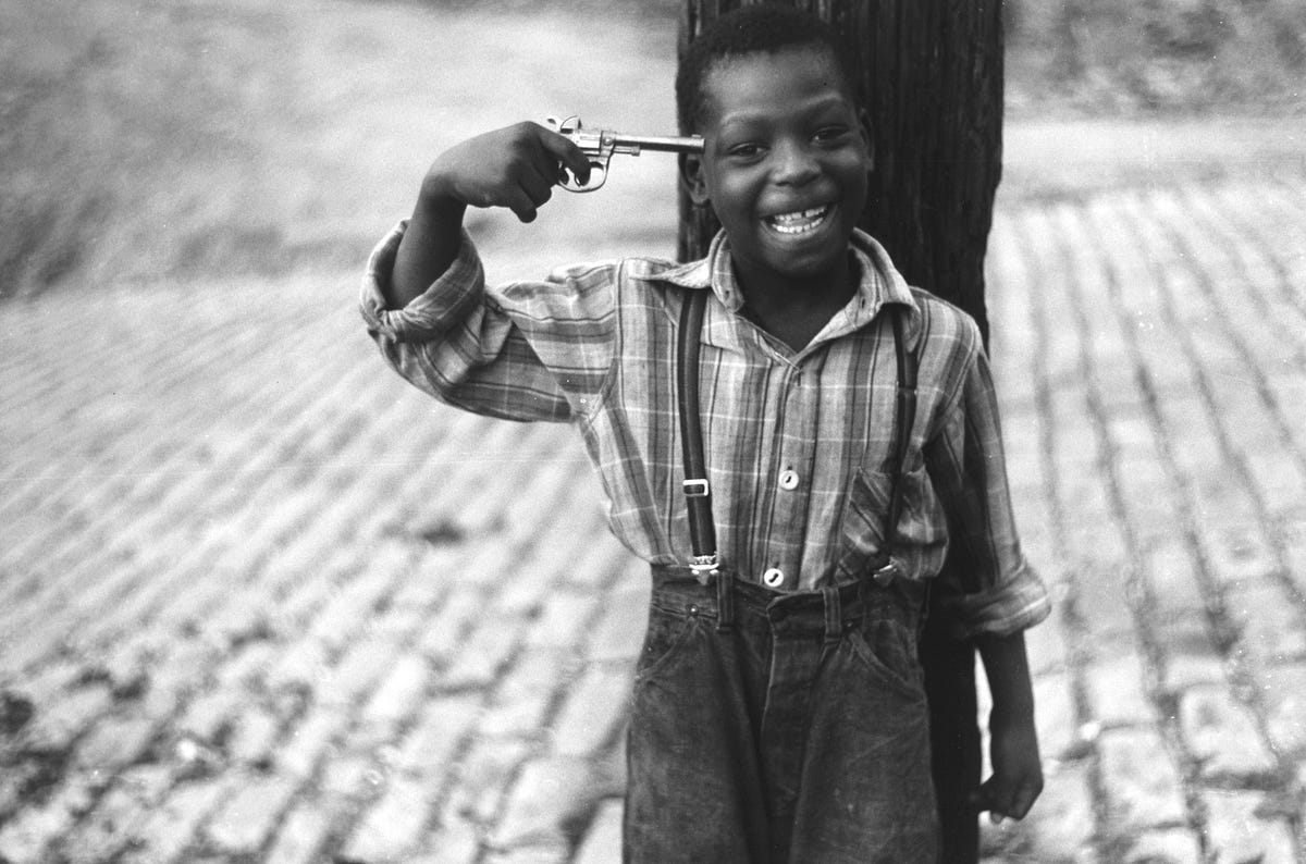This Week’s Photo — Boy with Pistol — Elliot Erwitt | by Arshdeep ...