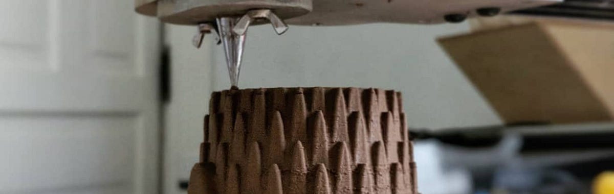 3D Printing in Clay: Using A Synchronized Auger Extruder With a ...