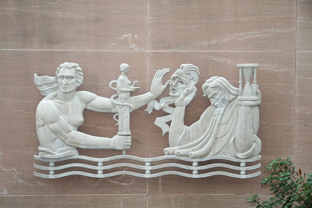 Symbols, sculptures, the US Army Medical Corps, and a building in ...
