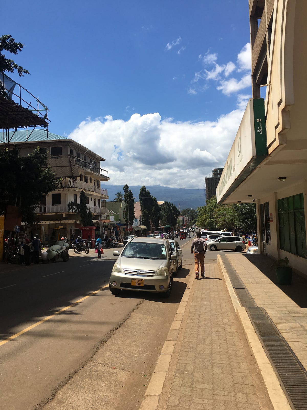 Moshi Town. Motorbikes, bajajis, buses, cars, and… | by Alexander O ...