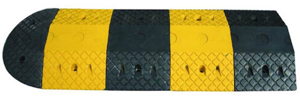Smooth Traffic Flow with Heavy Duty Rubber Speed Humps — Arrow Safety ...