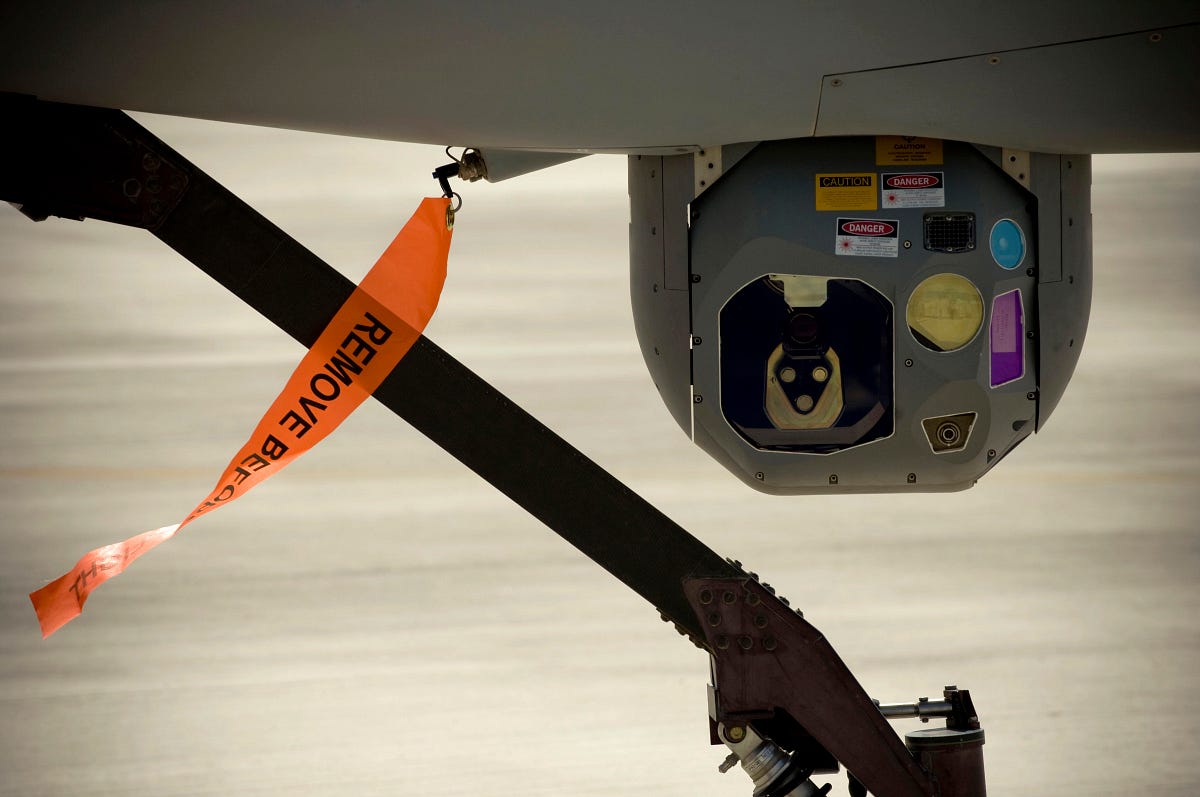 Video: Afghans Throw Rocks at Crashed Predator Drone | by Trench Art ...
