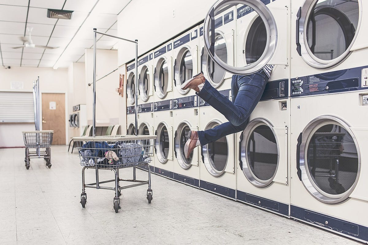Why does the drying machine beat with rhythm as its barrel rolls? My ...