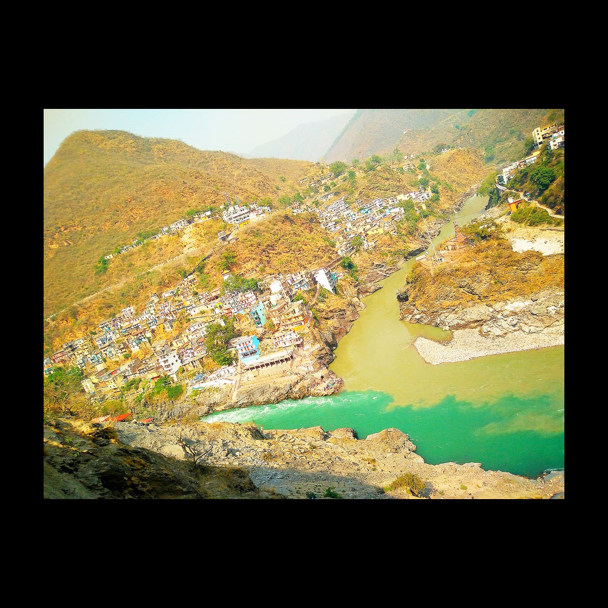 Devprayag, the holy confluence. The fast flowing Bhaghirathi cuts into ...