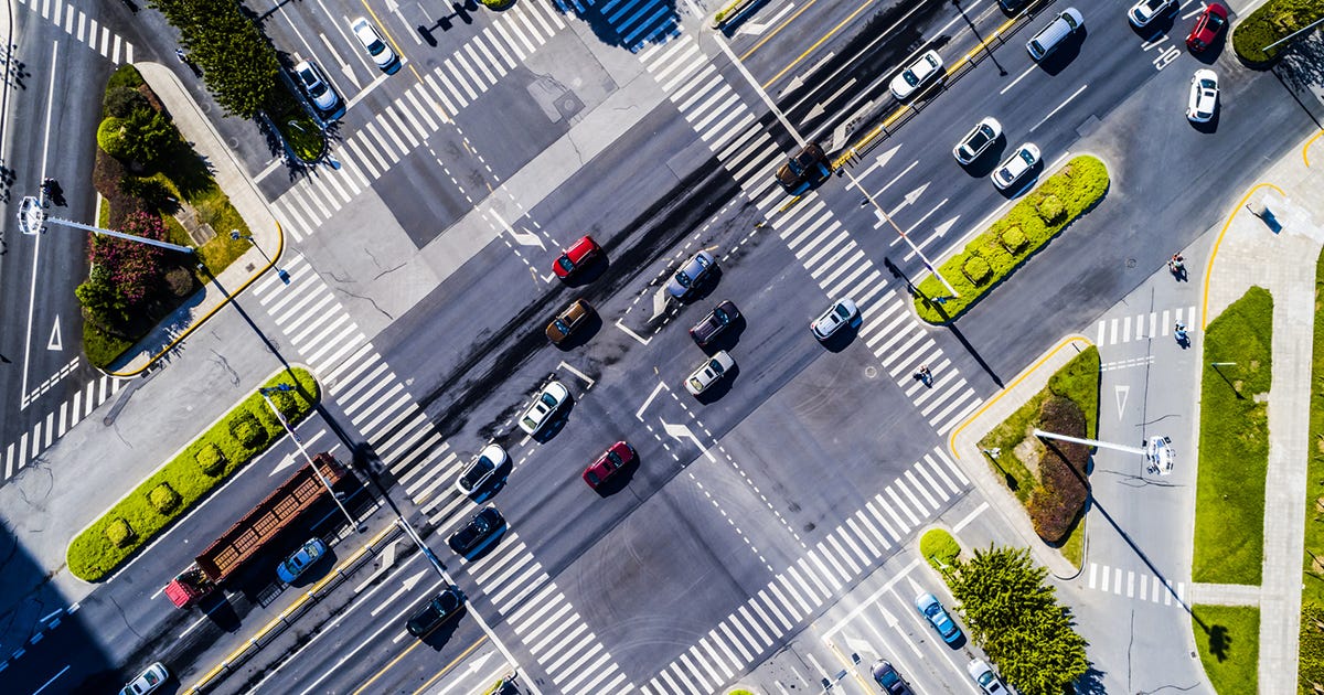 SURTRAC Smart Traffic System. Millions of cars pass through a large ...