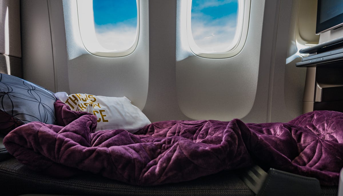 Qatar Airways Qsuites Review. Originally published by One Mile at a ...