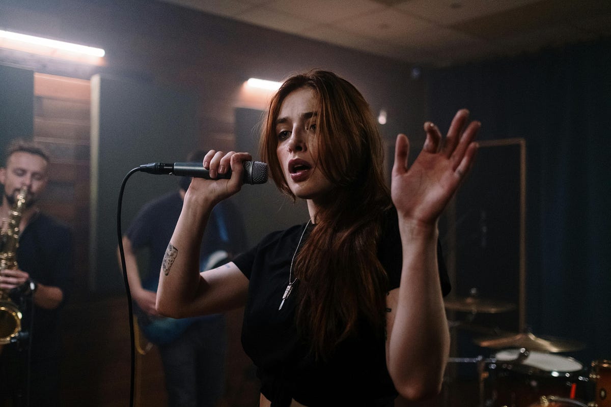 Does Gesturing While Singing Improve Vocal Performance? | by Chandrayan ...