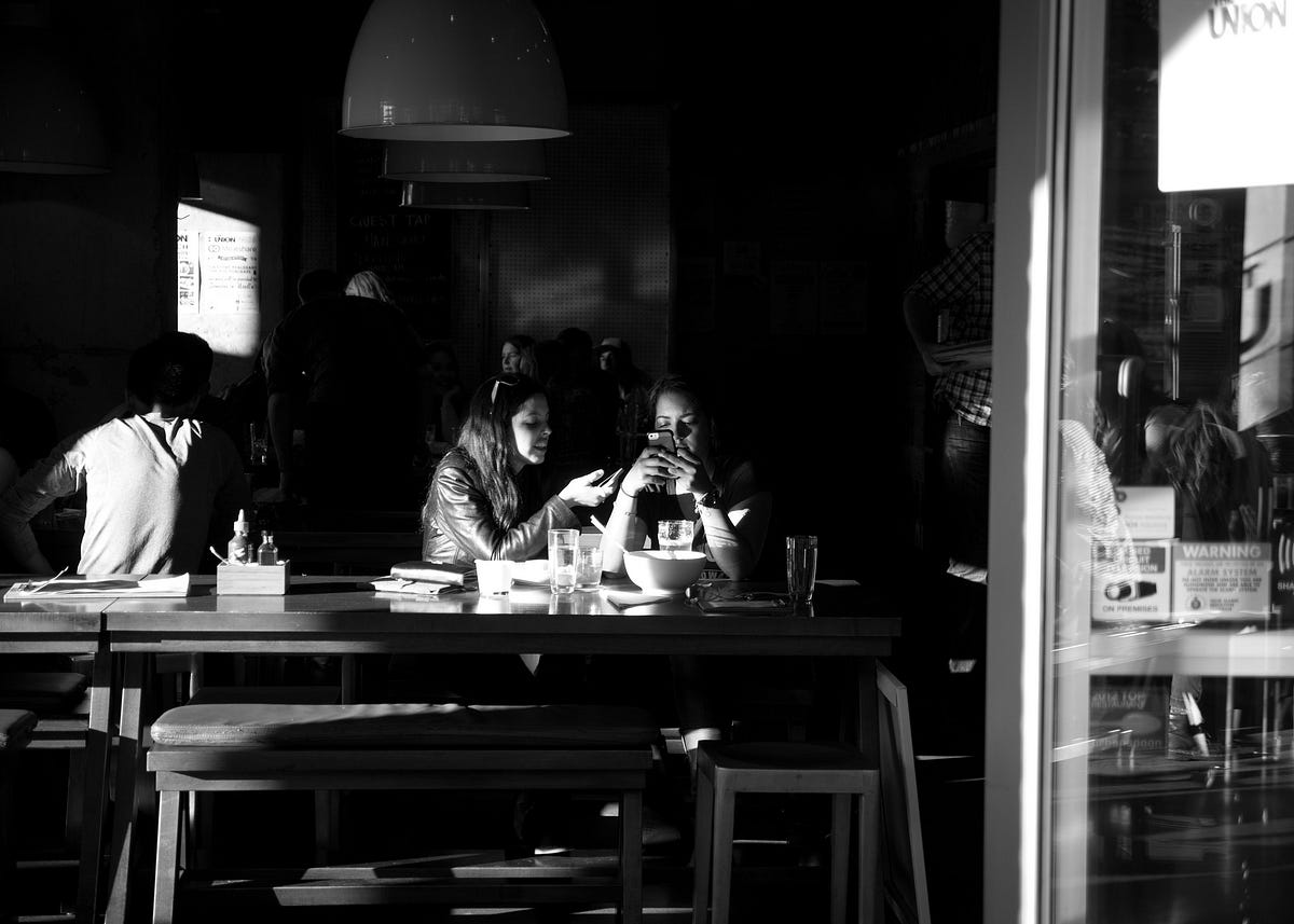 Disconnect. She gazes at her phone | by Carissa | Photographs and ...