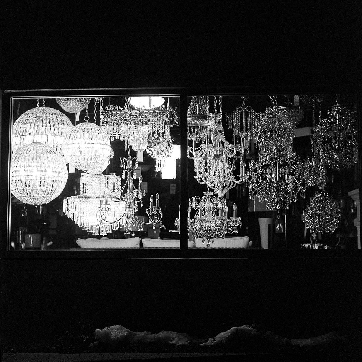 Sight. Light fixture store window at night… | by rlboston | Medium