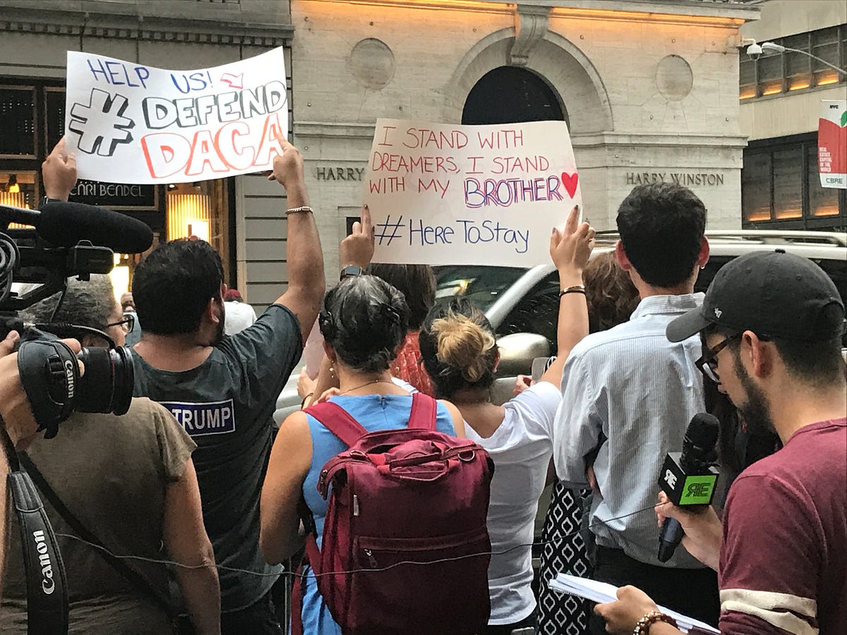 Posters in hand, beliefs concrete, DACA supporters refuse to accept ...
