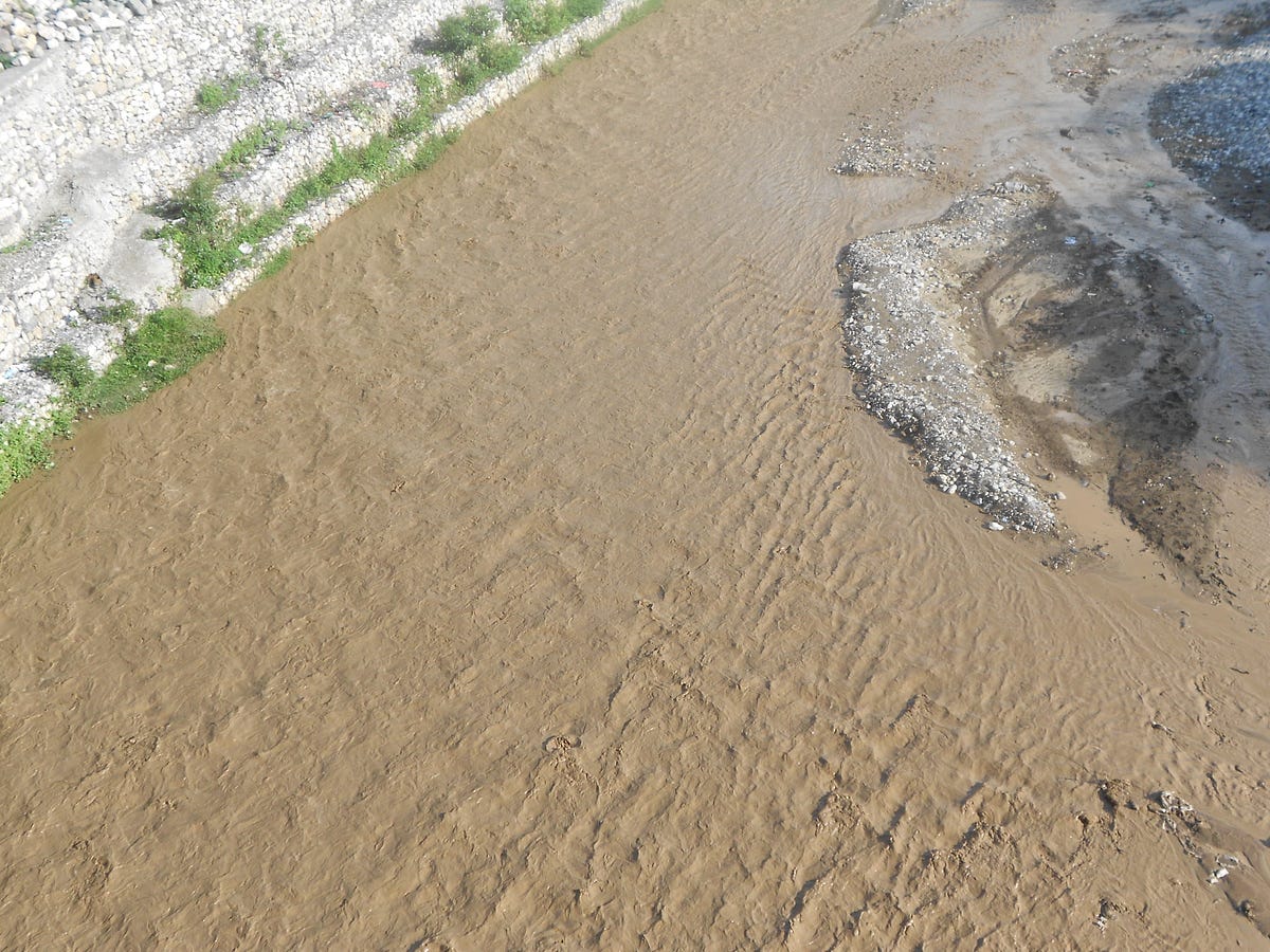 Raging River / Shrinking Land. Haiti gives up more of itself to the… | by Paul E. Fallon | Medium