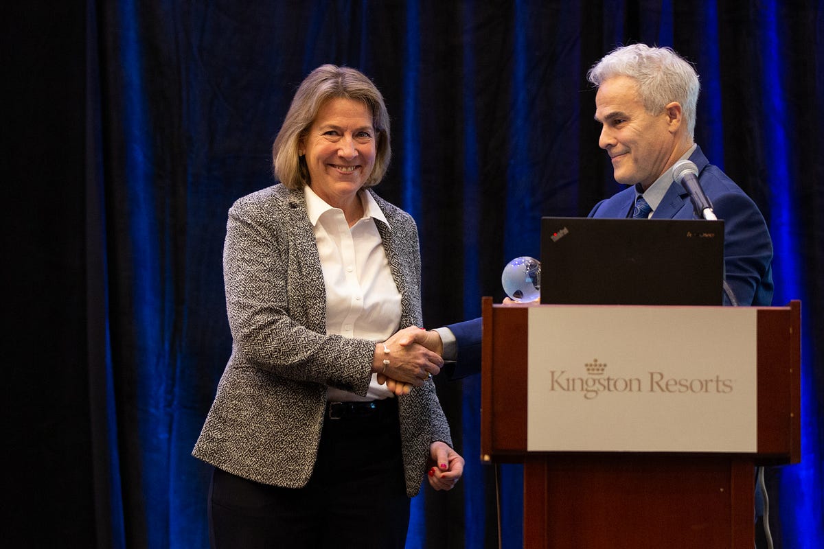Anne Hale Miglarese of Radiant Earth Foundation presented with the ...