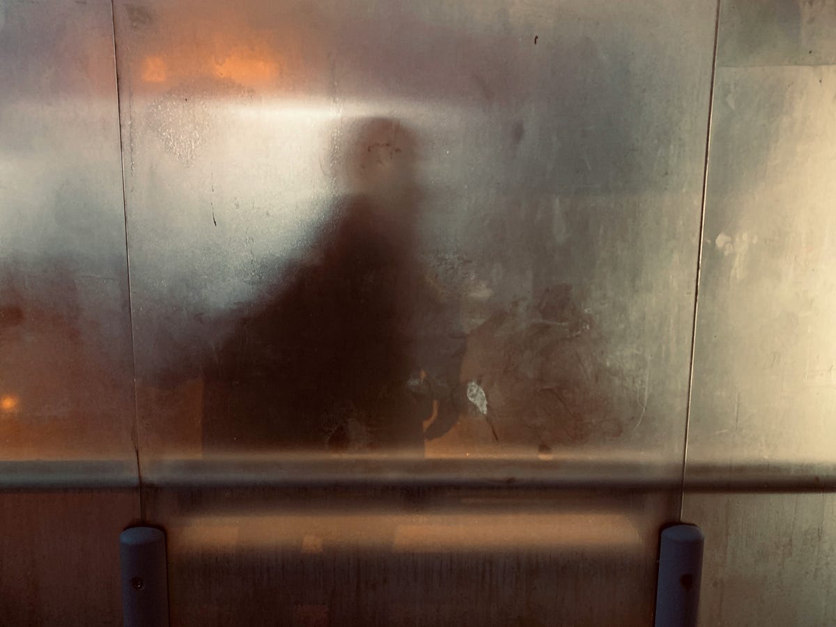 A Young Man and the Gloomy Night. The face of a young man, devoid of ...