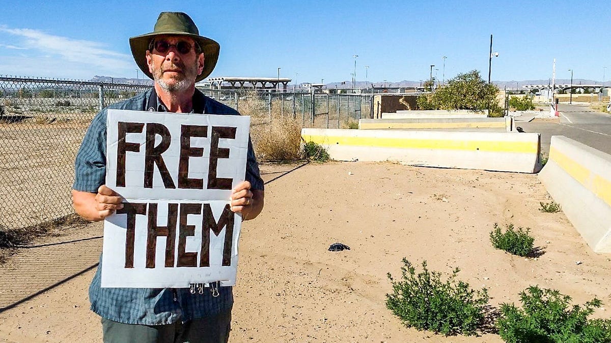 FREE THEM! How One Man with a Bold Sign and a Commitment to Witness ...