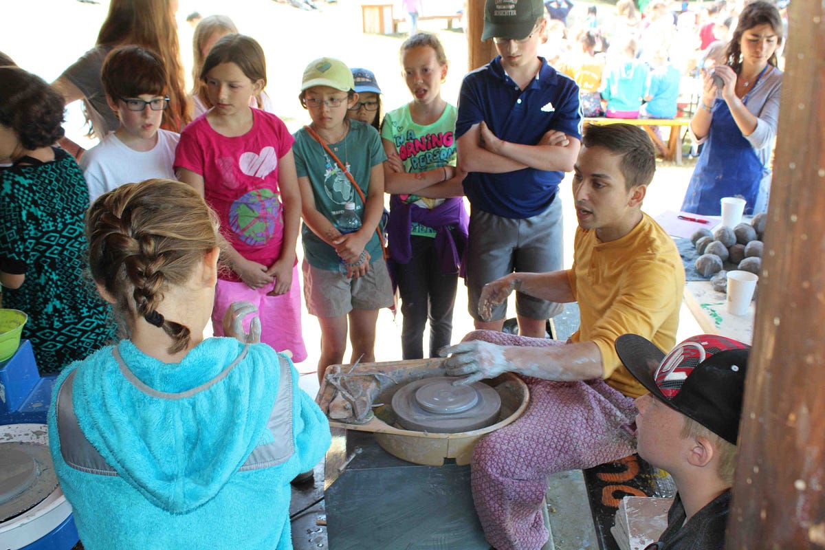 Teaching children hand-made pottery on the potter’s wheel. | by Blake ...