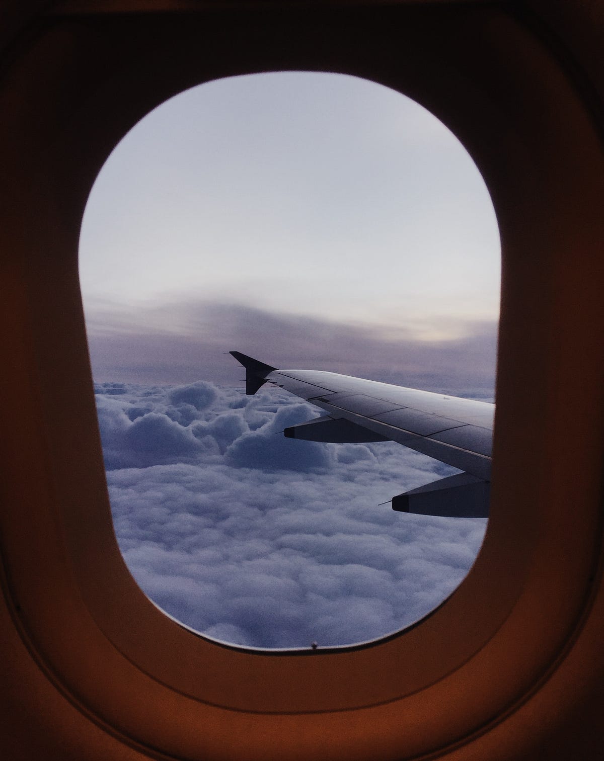 Flight 878. As she stared into the clouds below… | by Venu ...