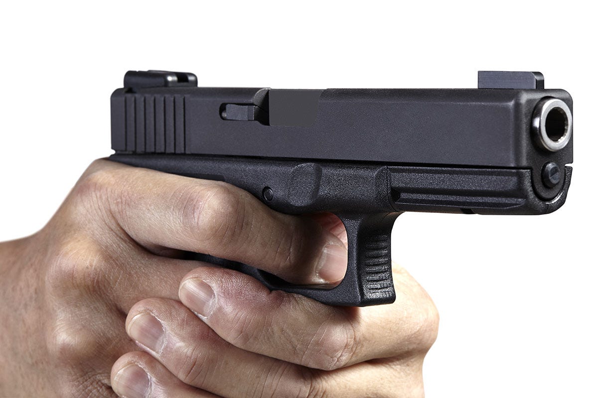 Grip and Stance Tips for Shooting Your Pistol | by GunBroker.com | Medium