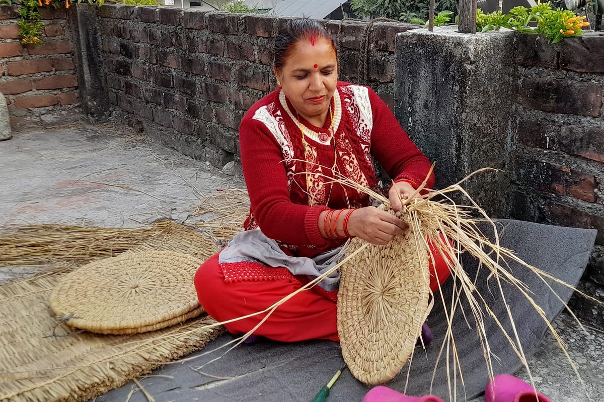 A woman of Lakshmimarg in Morang is making straw mats. Recently, the ...