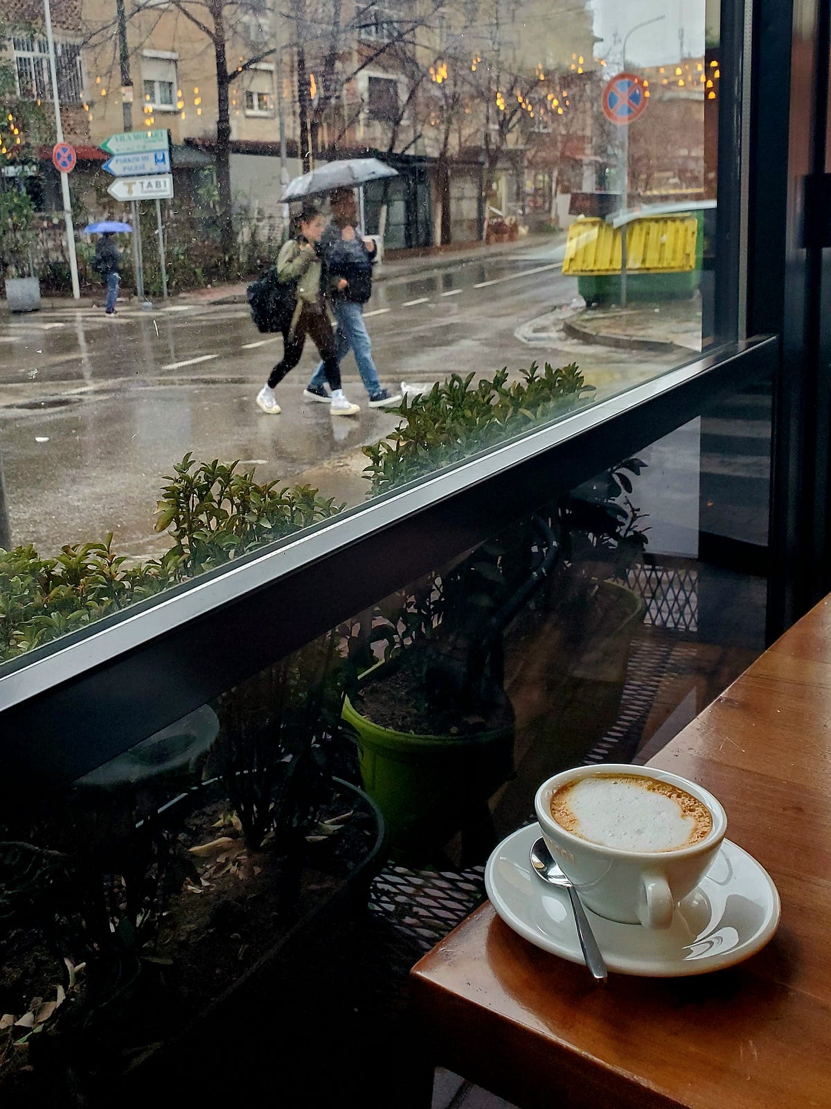 She sits across from you at a small table, a coffee by her side. | by ...