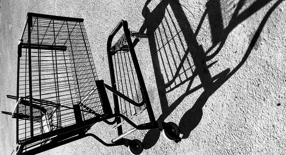 Paradox of Plenty. Ladders of labels loom in long aisles… | by Emma ...