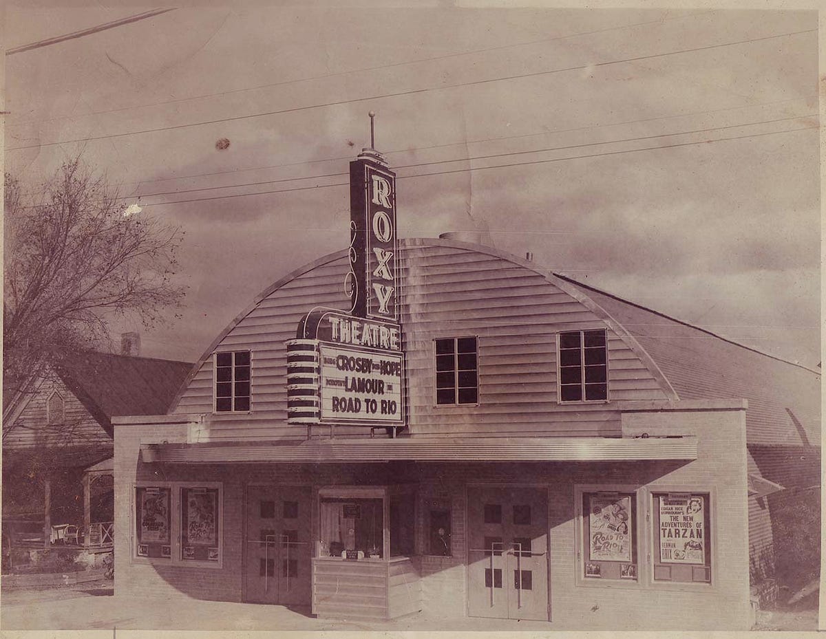 Lost History of the Roxy Theatre. A grainy old photo shows a crowd ...
