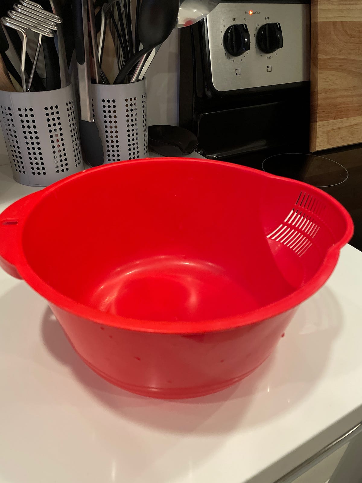 The red Tupperware. As I was zipping my last suitcase… | by Patricia ...