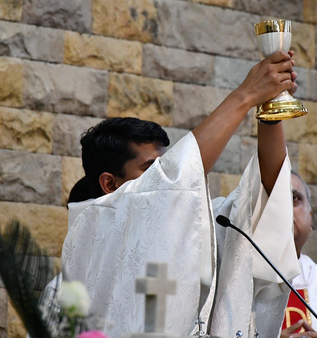 A priestly experience. Raising the Chalice | by arun simon | Medium