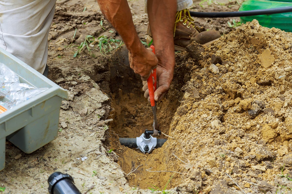 Underground utilities in yard - Green Arbor Landscaping - Medium